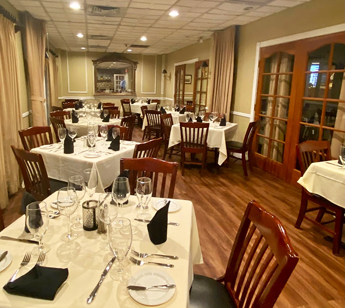 White tablecloths and warm wooden chairs create that perfect balance of elegance and comfort&mdash;fancy enough for celebration, relaxed enough for Tuesday.