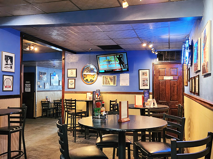 Blue walls, yellow wainscoting, and comfortable seating create that perfect "everybody knows your name" vibe. The kind of place where calories don't count and conversations flow freely.