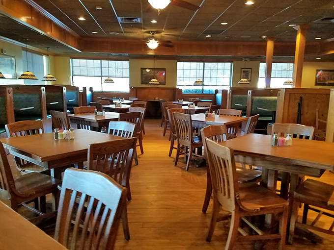 Wooden chairs, cozy booths, and warm lighting create that perfect "everybody knows your name" vibe&mdash;minus Norm and Cliff arguing at the bar.