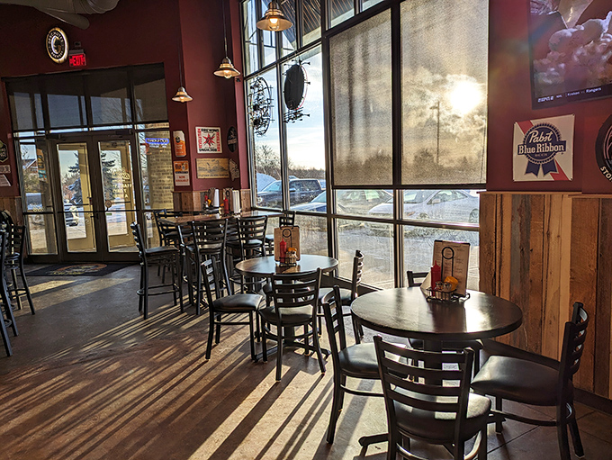 Sunlight streams through tall windows, creating the perfect ambiance for both serious eating and casual conversation. Wisconsin comfort at its finest.