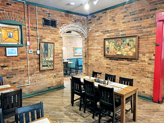 Exposed brick walls create the perfect backdrop for intimate dining, where every archway feels like a gateway to another delicious dimension.
