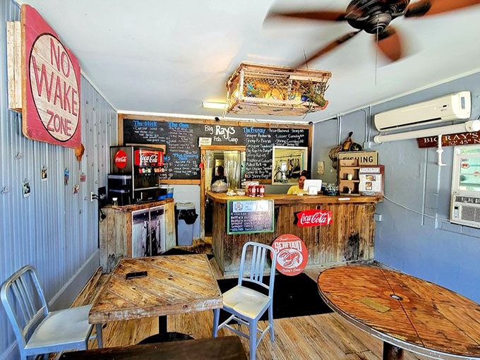 Step inside where fishing nets and weathered wood create the perfect backdrop for serious seafood.