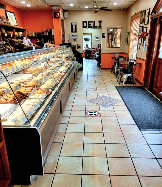 Step inside where authentic German flavors await behind gleaming display cases filled with edible masterpieces.