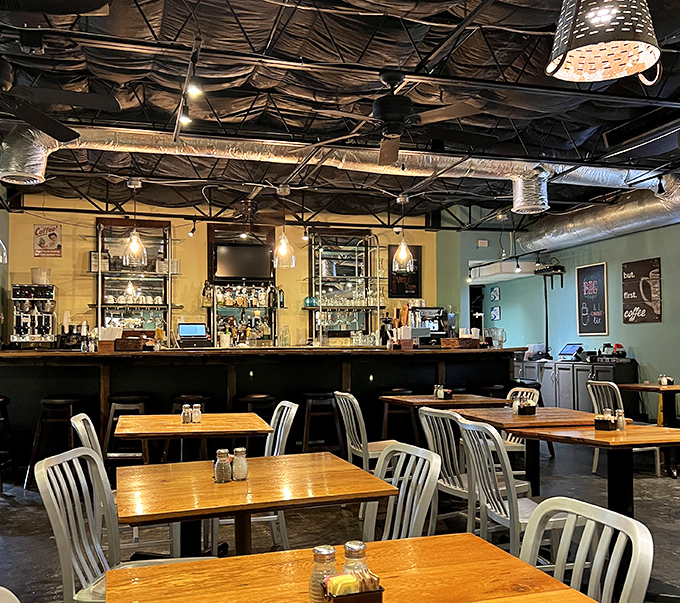Industrial-chic meets Southern comfort in this inviting dining space, where every wooden table has hosted countless "Oh my God, you have to try this" moments.