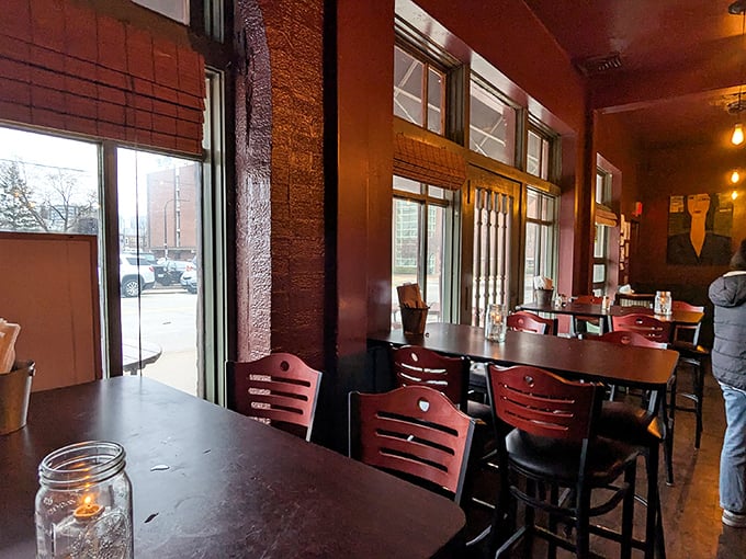 Warm wooden tones and cozy seating create that rare atmosphere where lingering over a meal feels not just allowed, but encouraged.