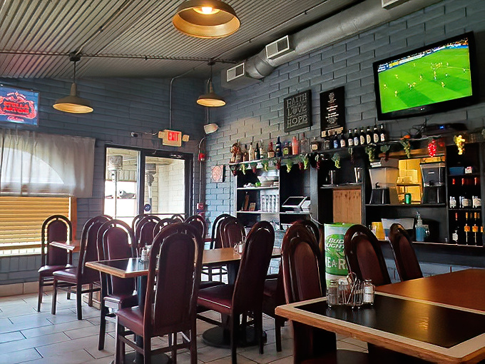 Industrial meets homey in this dining room where soccer matches play on TV while patrons debate the eternal question: one more slice of garlic bread or save room for tiramisu?