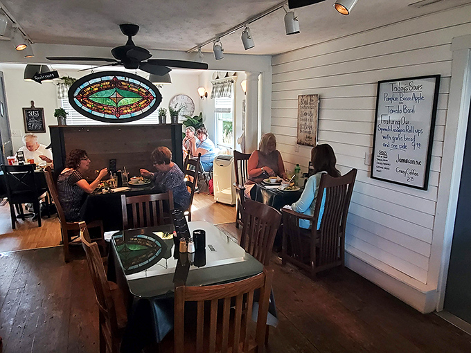 Step into this cozy dining room where comfort food dreams come true on every table.