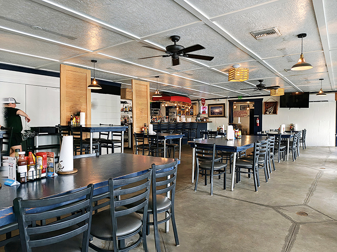 Inside, ceiling fans lazily spin above simple tables where seafood dreams come true. This isn't Instagram-bait d&eacute;cor&mdash;it's the authentic stage for some serious Gulf Coast magic.