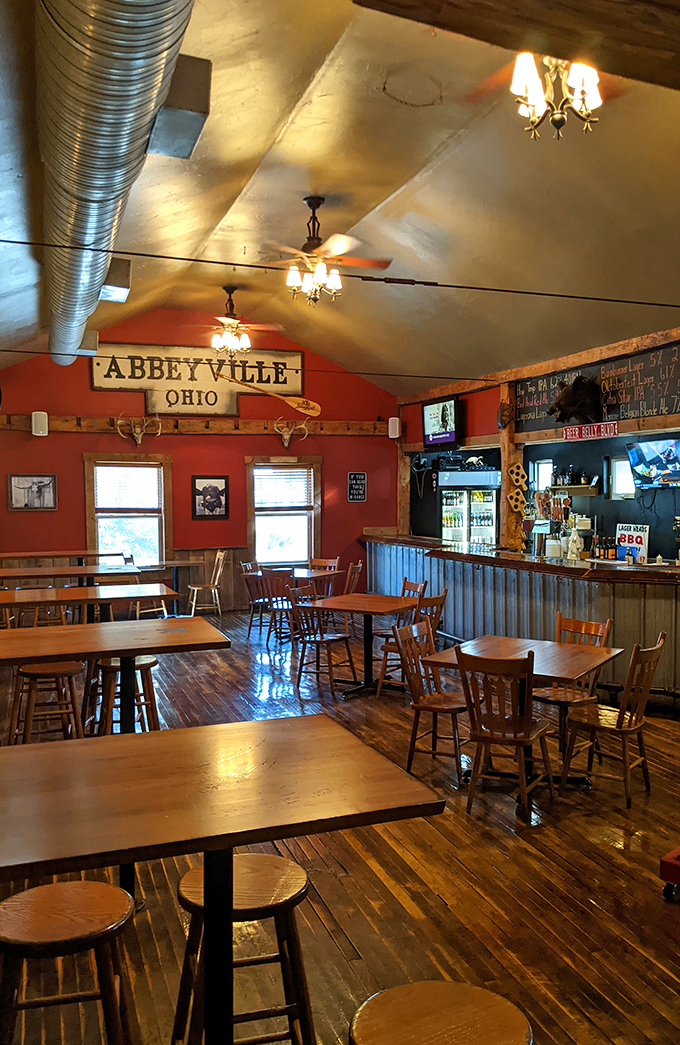 Step into this cozy haven where exposed beams and warm lighting create the perfect barbecue sanctuary atmosphere.