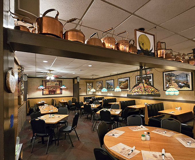 Copper pots gleaming overhead like culinary constellations, Tiffany lamps casting a warm glow&mdash;this isn't decoration, it's a time machine to Nonna's kitchen.