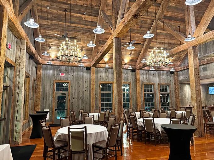 Rustic elegance defined: Massive timber beams and chandeliers create a dining room that feels both sophisticated and comfortably Midwestern.
