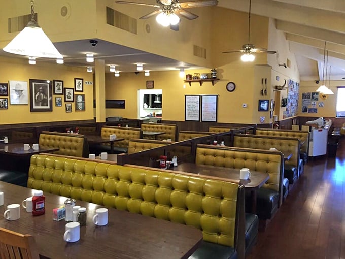 Step inside and the ornate tin ceiling whispers of history while the modern vibe shouts, "Grab a seat and prepare for deliciousness!"