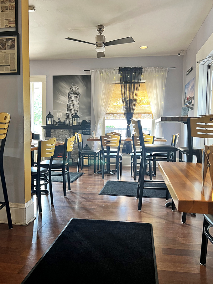 Italy meets Ohio in this cozy dining room where the Leaning Tower of Pisa watches over your meal like a carb-loving guardian angel.