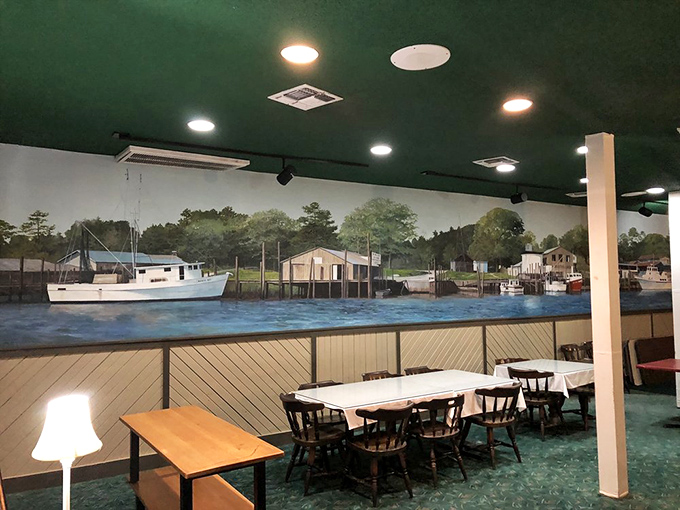 A coastal mural stretches across the dining room, bringing a slice of serene waterfront charm indoors while you wait for that legendary prime rib.