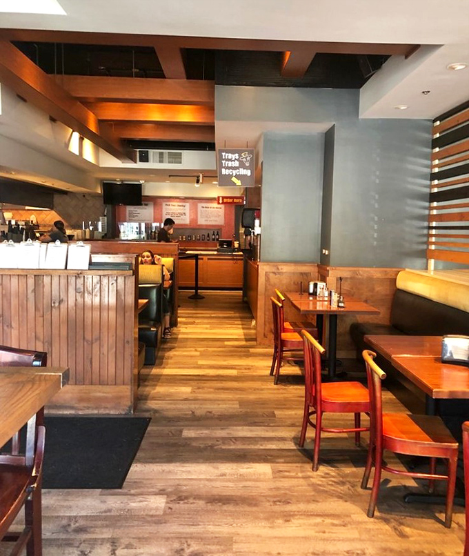 Warm wood tones, comfortable seating, and an open layout create the perfect backdrop for burger bliss—casual enough for lunch, nice enough for dinner.