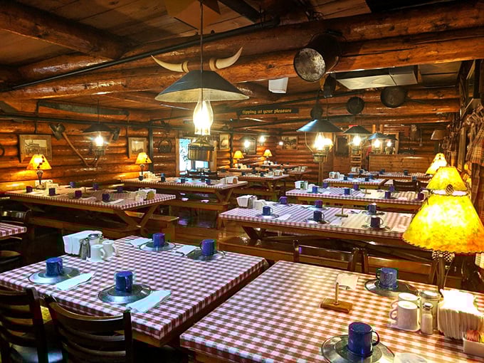 Stepping inside feels like entering a time machine to when dining meant community tables, checkered tablecloths, and the promise of honest-to-goodness comfort food.