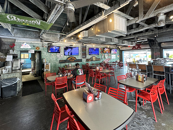 Inside, burgundy chairs and wood paneling create the perfect backdrop for conversations that flow as freely as the coffee.