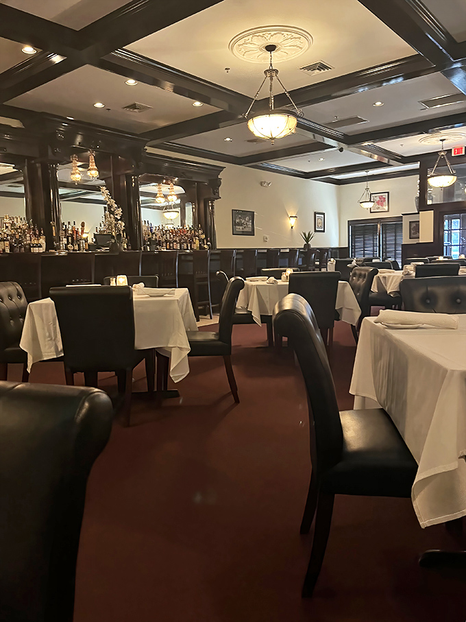 White tablecloths, dark wood accents, and elegant lighting create that rare atmosphere where you can celebrate anything from anniversaries to simply surviving Tuesday.