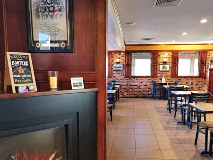 Warm wood paneling and brick accents create that perfect "come as you are" atmosphere where napkins aren't just provided&mdash;they're absolutely necessary.