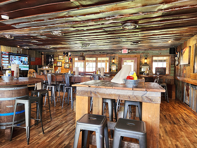 Inside, weathered wood and barrel tables create that "your cool uncle's cabin" vibe—if your uncle happened to be obsessed with serving incredible burgers in Tennessee.