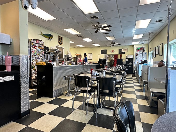 Classic black and white checkered floors, chrome accents, and counter seating&mdash;this is diner perfection where breakfast dreams come true.