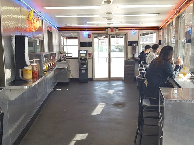 Step inside and time stands still. The checkered floor, red vinyl booths, and counter seating create the perfect backdrop for breakfast dreams and lunchtime conversations.