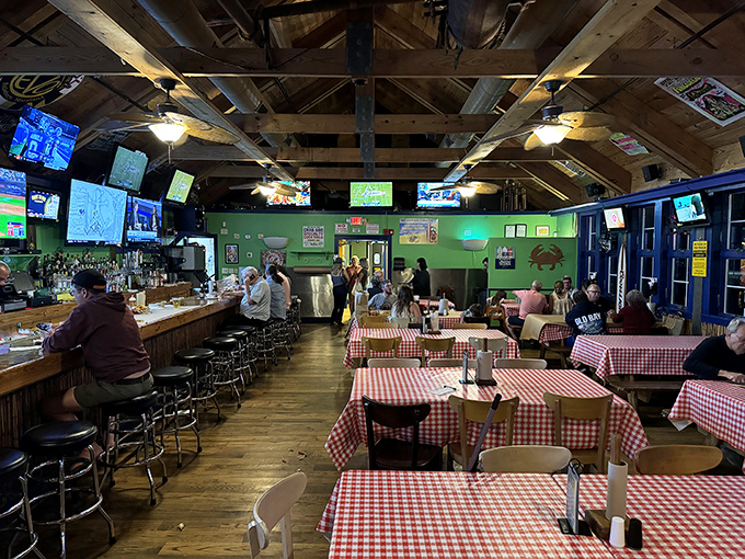 Red checkered tablecloths serve as both decoration and warning system. This isn't a place for your Sunday best&mdash;it's where memories are made one delicious, messy bite at a time.