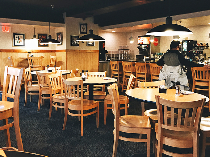 Where sports fans and seafood lovers unite under ceiling fans and the promise of perfection.