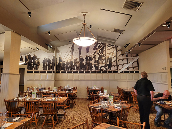 Historical photographs watch over diners as they plot their smorgasbord strategy amid wooden chairs that have witnessed countless "just one more bite" moments.