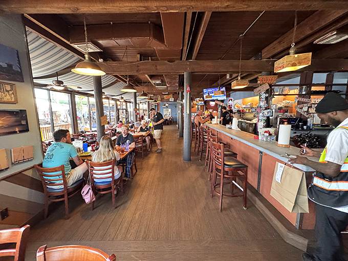 Inside, wooden beams and nautical touches create the perfect backdrop for seafood feasting—like dining in the galley of a particularly delicious pirate ship.