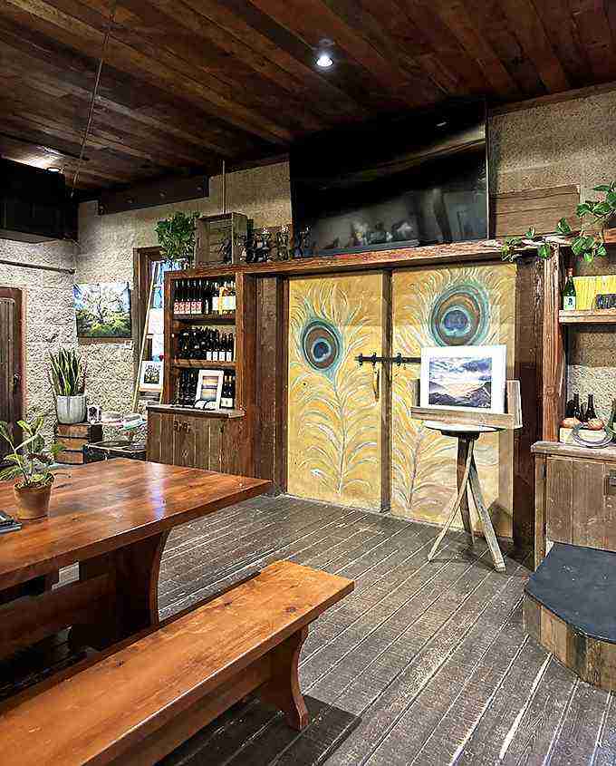 Inside, time stands still &ndash; rough-hewn wood, stone walls, and those whimsical peacock doors create an atmosphere no designer could replicate if they tried.