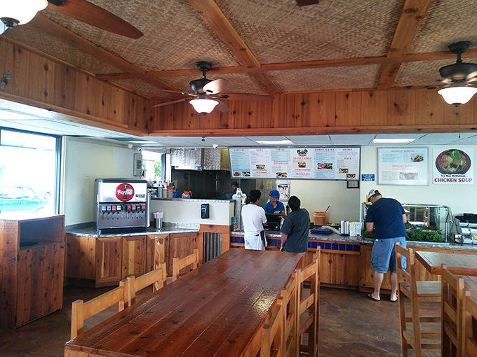 Rustic wooden tables and woven ceiling details create a casual, beachy vibe&mdash;perfect for focusing on what really matters: the food.