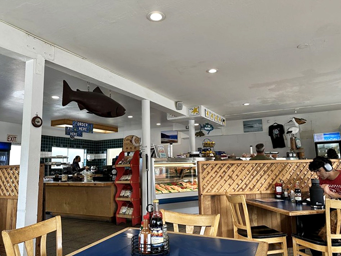 Wooden lattice, nautical decor, and that watchful fish overhead &ndash; this isn't Instagram bait, it's the real McCoy of seafood joints that existed long before selfies.