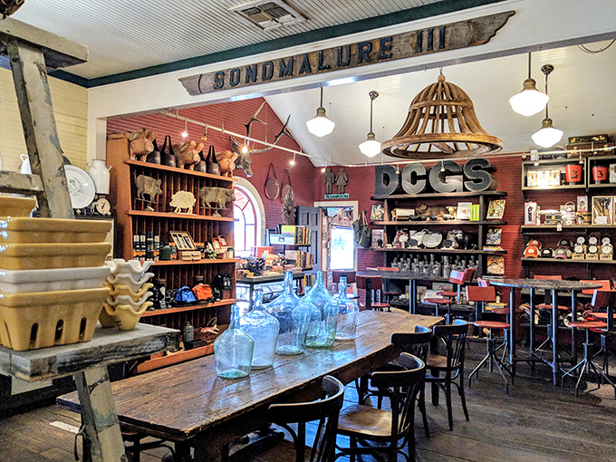 Inside, time slows down under vintage lighting and weathered wood. The "DCGS" letters and rustic décor tell you this isn't your average convenience stop.