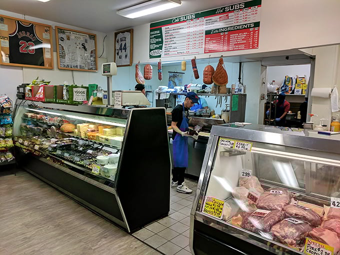 Behind the counter, culinary magic happens with practiced precision. This isn't dinner theater&mdash;it's lunch artistry in its purest form.