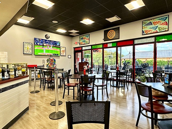 Warm wood tones and comfortable seating create that perfect sweet spot between "nice enough for an anniversary" and "relaxed enough to wear your favorite jeans."