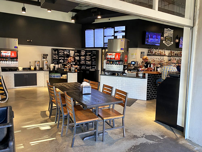 The interior strikes that perfect balance between "serious about barbecue" and "come as you are" &ndash; industrial chic meets Southern hospitality.