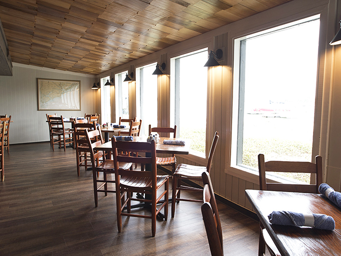 Wooden beams, natural light, and water views create the perfect backdrop for seafood feasting. No fancy frills needed when the scenery does the talking.