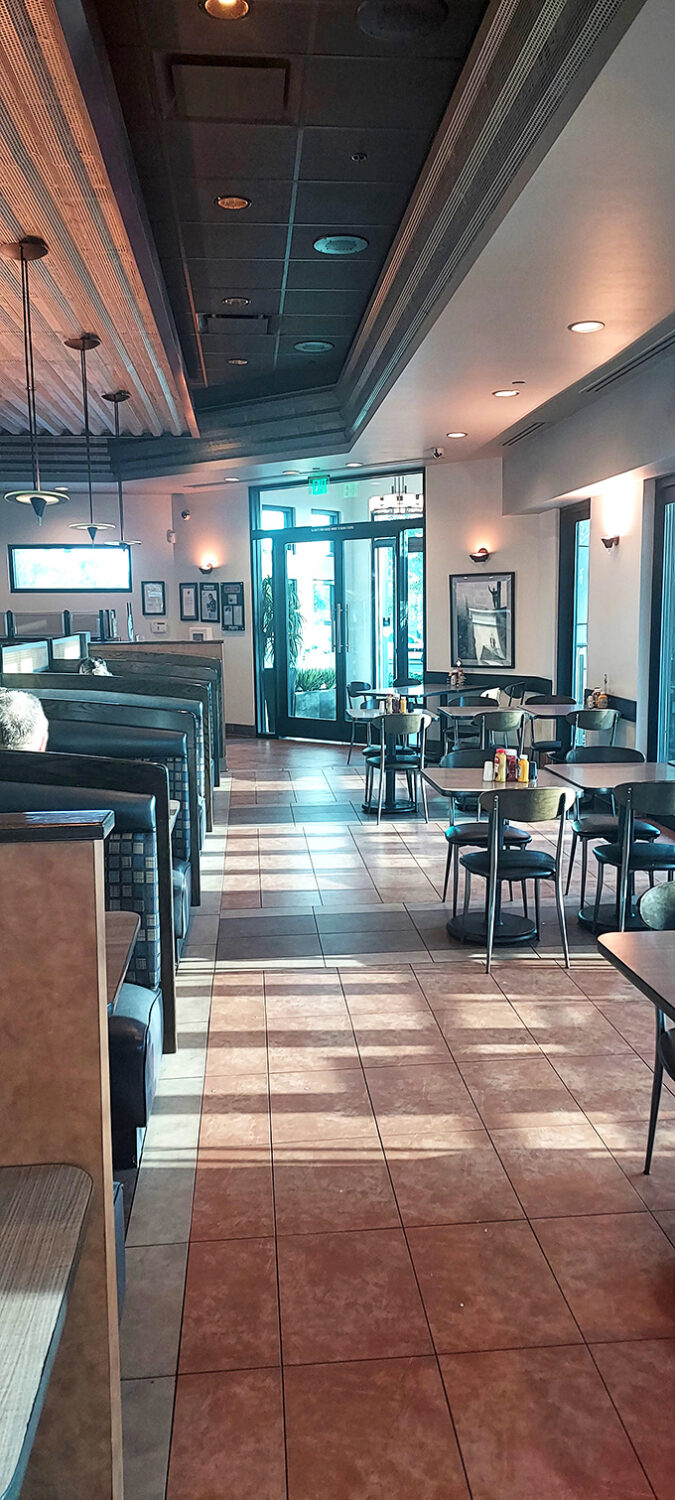 Classic deli ambiance meets modern comfort in this thoughtfully designed space. The booths practically whisper, "Sit down, stay awhile, you're going to need time to finish that sandwich."