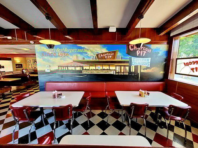 Italian countryside murals transport you from Delaware to Tuscany, while those wooden tables have witnessed countless "first bite" moments of pure sandwich bliss.