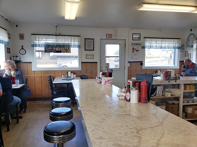 Classic diner vibes where vinyl seats have heard more life stories than a bartender on New Year's Eve.