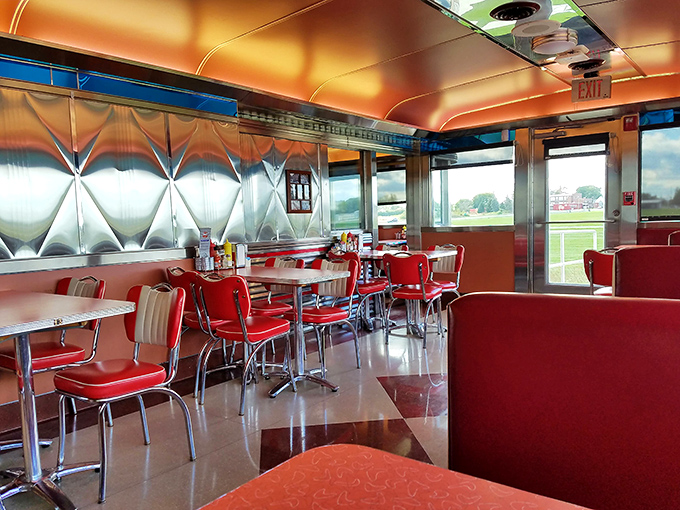 Classic red vinyl meets polished chrome in this retro paradise. The diner's interior feels like stepping into a 1950s postcard where calories don't count.