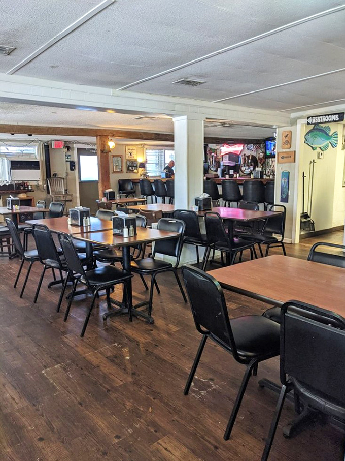 Where wooden floors tell stories and fish-shaped bathroom signs point the way, The Point's dining room promises zero pretension and maximum satisfaction.