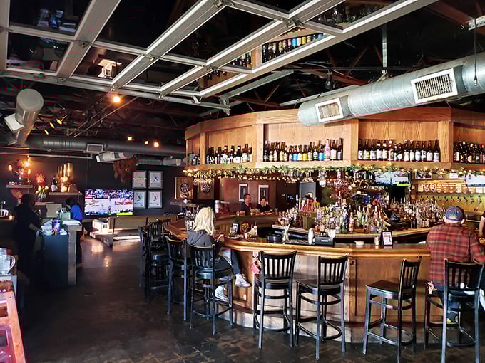 The warm wooden bar, stocked with an impressive array of bottles, feels like the living room you wish you had&mdash;if your living room served perfect pints.