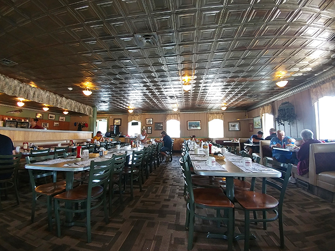 That pressed tin ceiling isn't just vintage charm&mdash;it's witnessed decades of satisfied sighs from diners who've found their breakfast happy place.