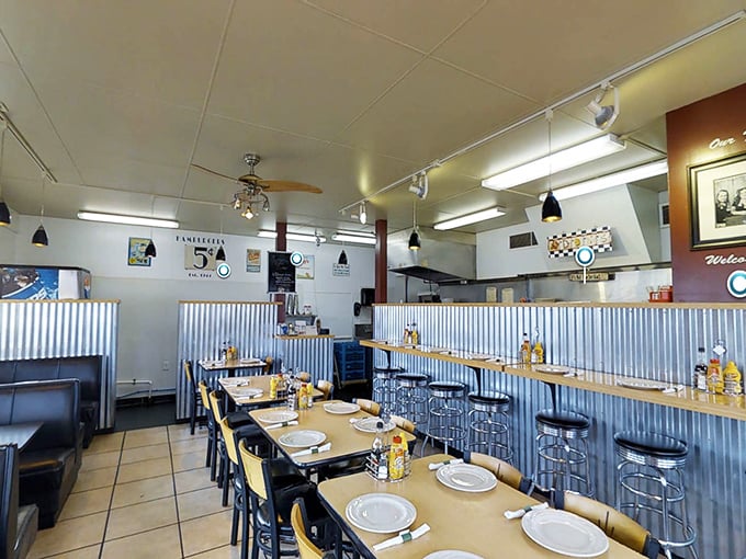 Step inside this retro wonderland where corrugated metal meets comfort food and every seat promises satisfaction.