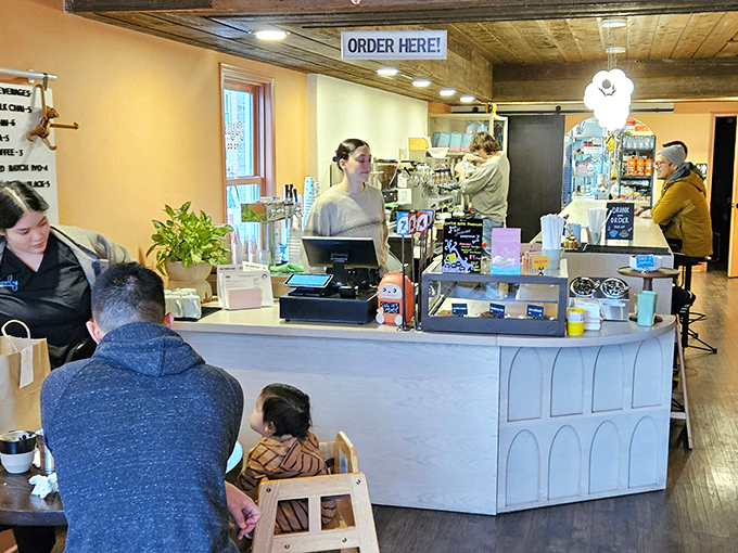 The counter service setup keeps things casual, while the wooden ceiling beams whisper stories of the building's history.