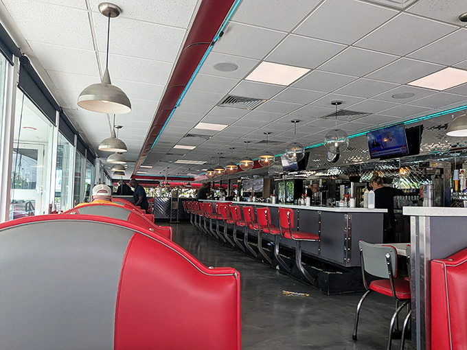 Classic Americana in every detail: those fire-engine red booths aren't trying to be retro, they're the real deal that never went out of style.