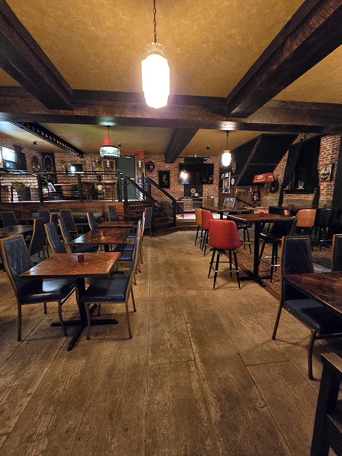 Exposed brick walls and wooden beams tell stories older than most of our first cars, creating an atmosphere no designer could replicate with a Pinterest board.