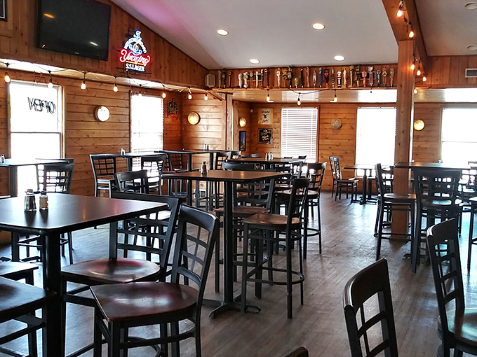 Step into this cozy time capsule where red booths and friendly faces create the perfect breakfast sanctuary atmosphere.